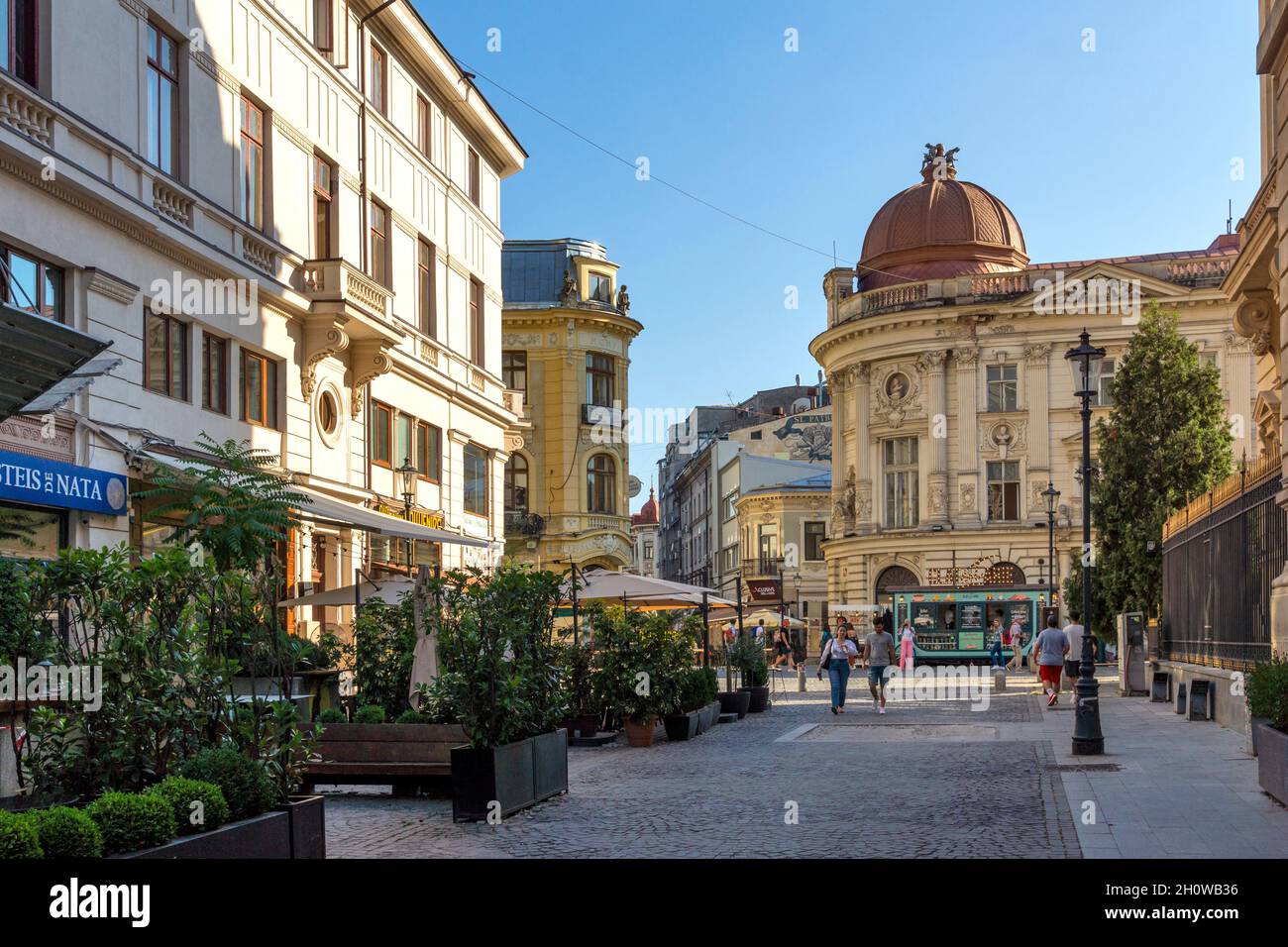 BUCHAREST, ROMANIA - AUGUST 16, 2021: Typical street and buiding at ...