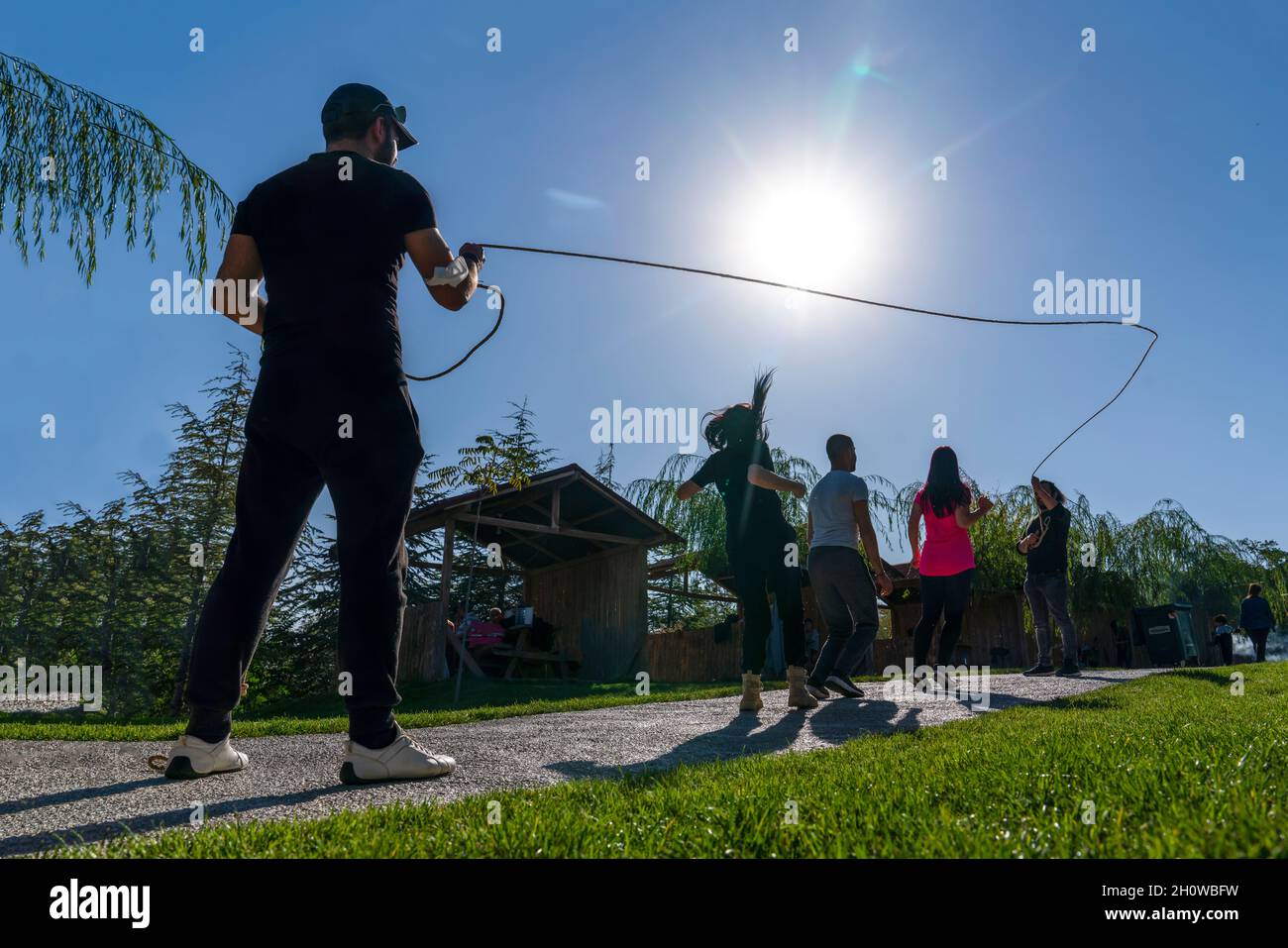 Children girls skipping rope hi-res stock photography and images - Alamy