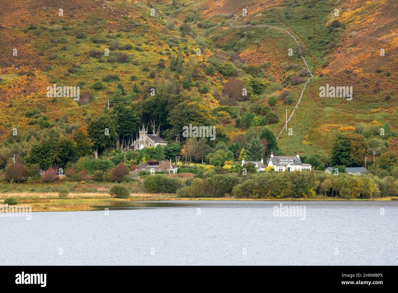 A view of the hamlet of Cappercleuch seen across St Mary's Loch, in the ...