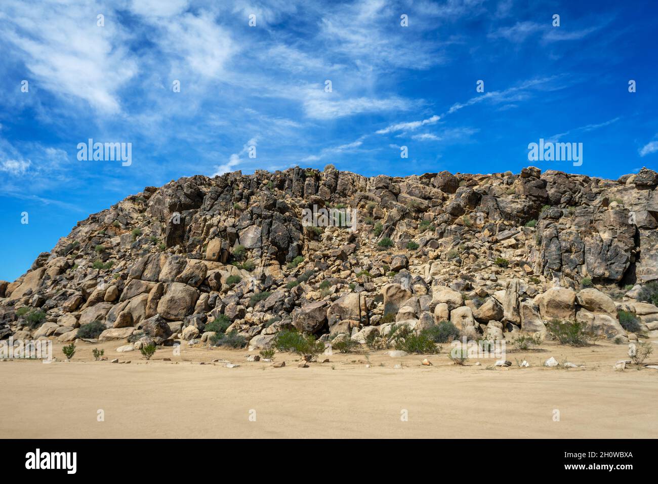 A hill with rock and boulders on a hill at Horsemen’s Center Park in ...