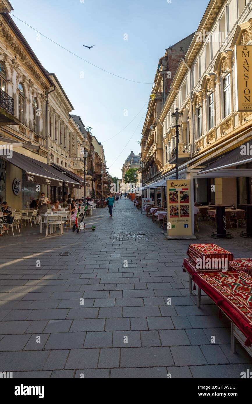 BUCHAREST, ROMANIA - AUGUST 16, 2021: Typical street and buiding at ...