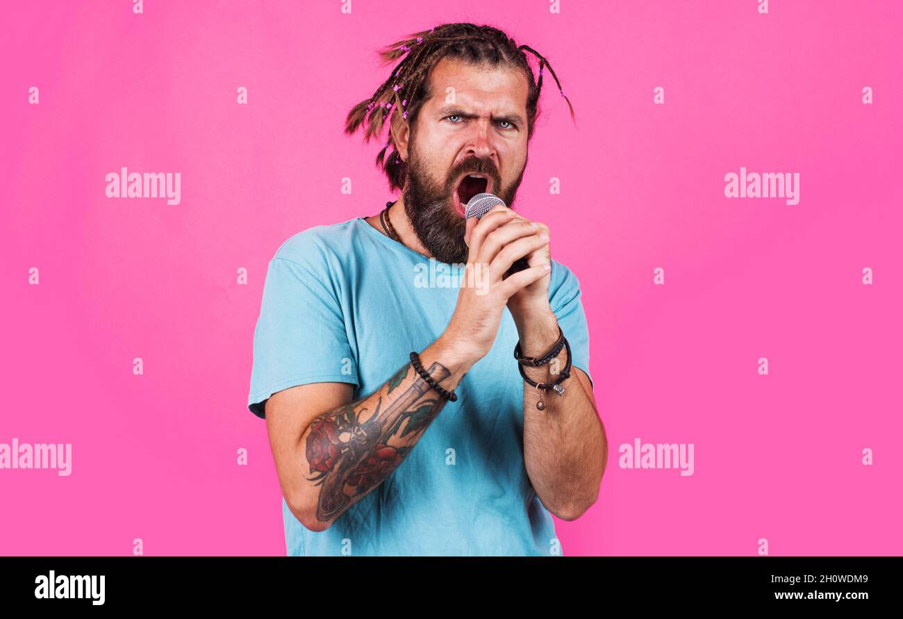 Bearded man singing with microphone. Music. Karaoke signer, musical ...