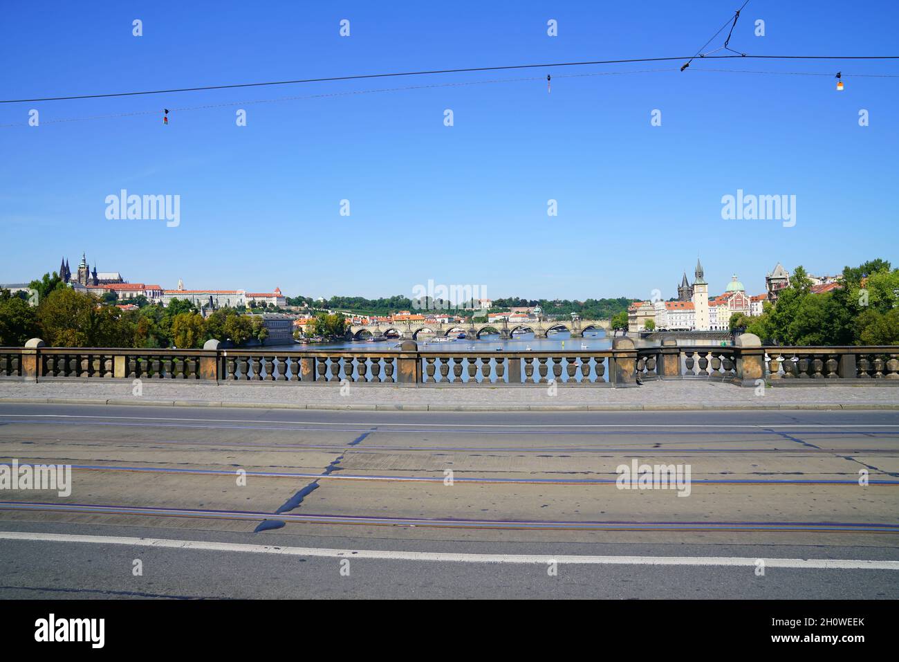 Palacky Bridge with tramlines and cables overlooking Vltava River and ...