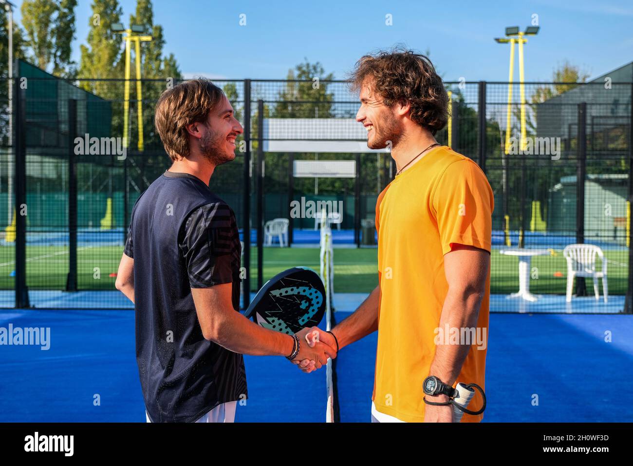 Portrait of handshake of two padel tennis players - Padel players ...