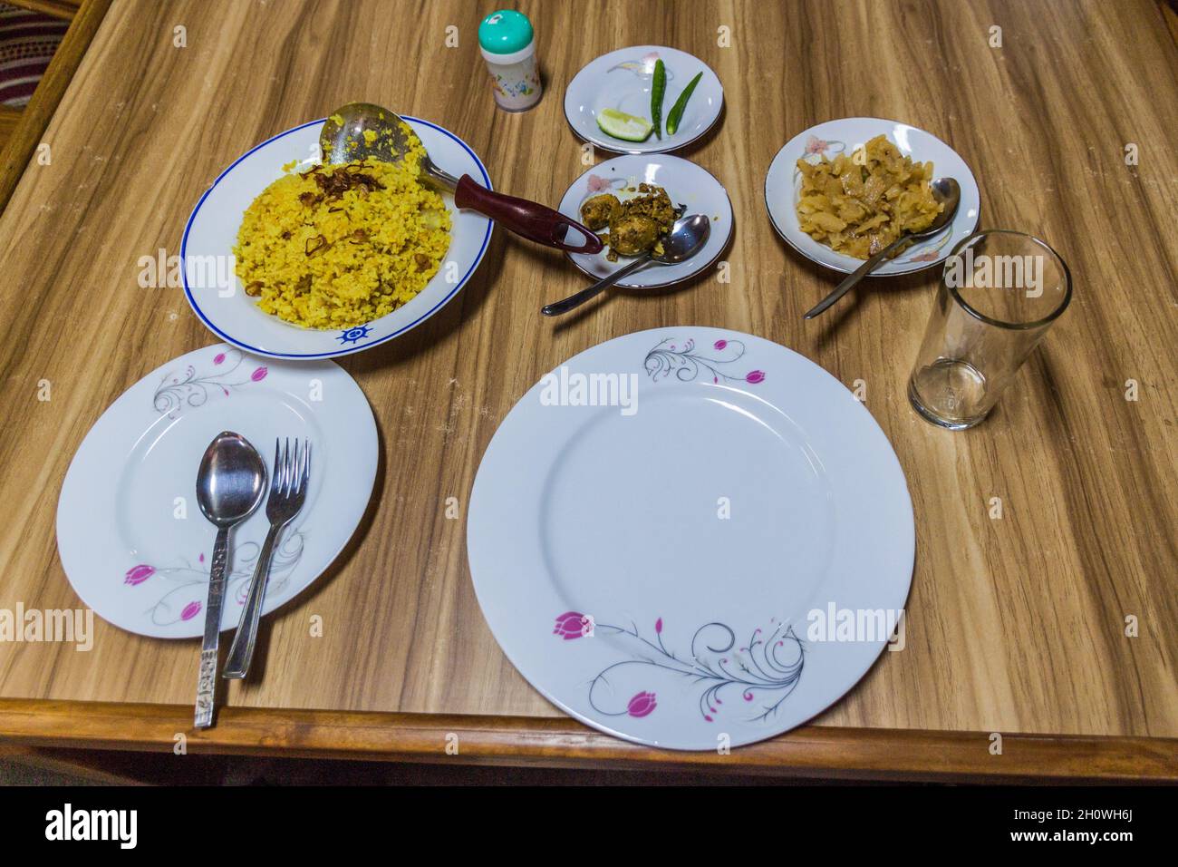 Food in Bangladesh - Vuna kichuri, Dim curry and Shobji Stock Photo - Alamy