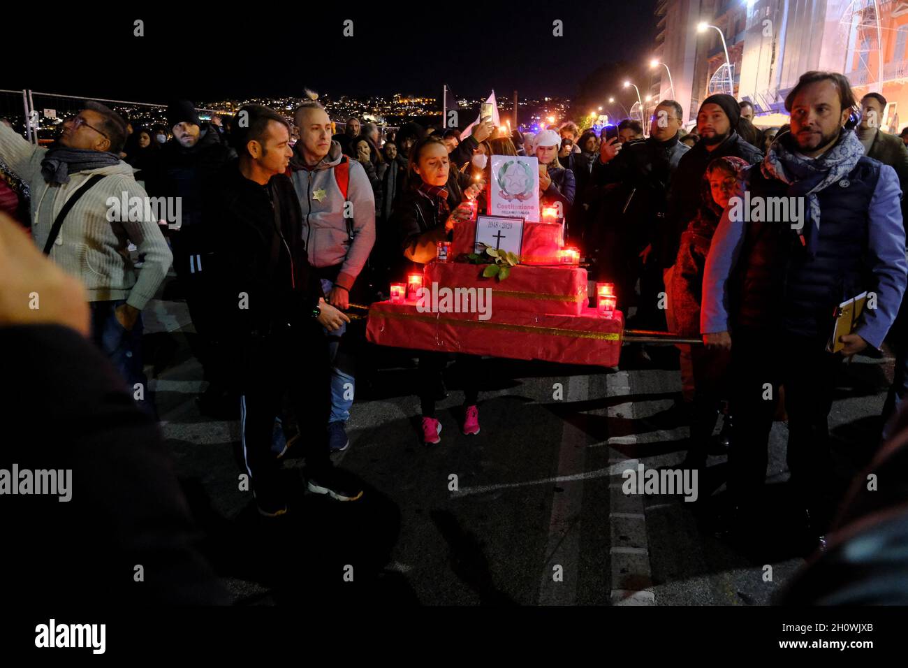 Demonstrators march through the streets of the Naples seafront ...