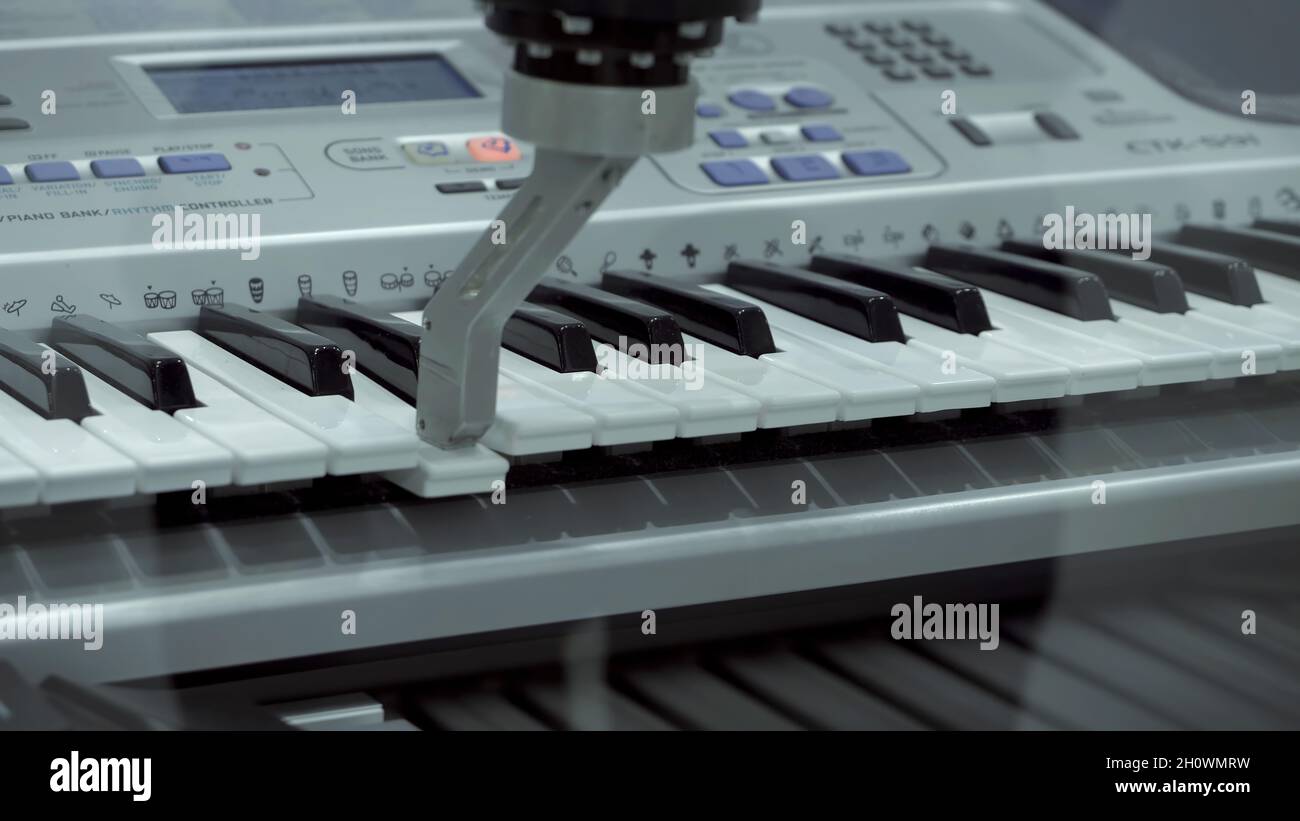 Robotic hand piano hi-res stock photography and images - Alamy