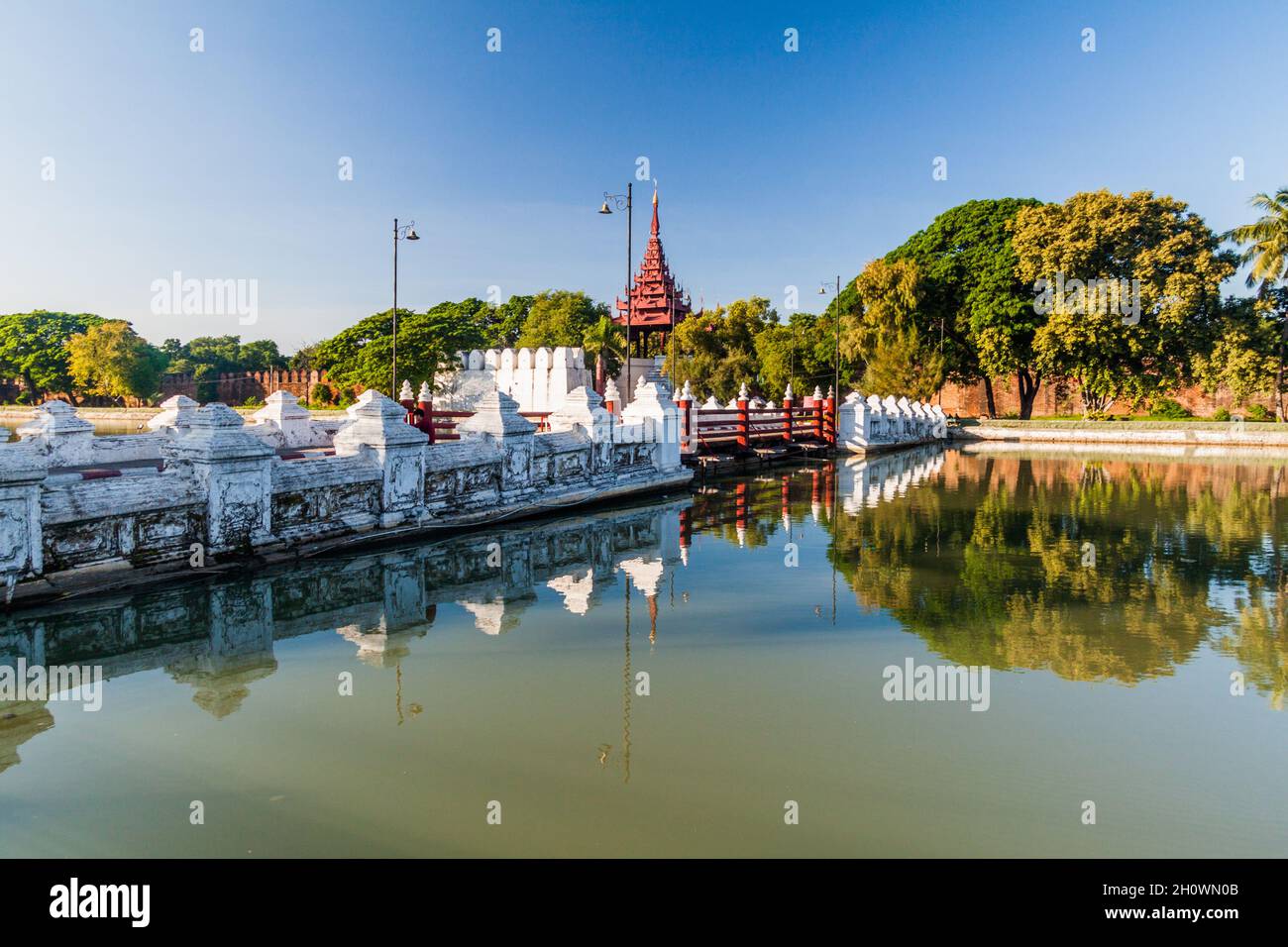 Moat, bridge, walls and a tower of Mandalay Fortress, Myanmar Stock ...