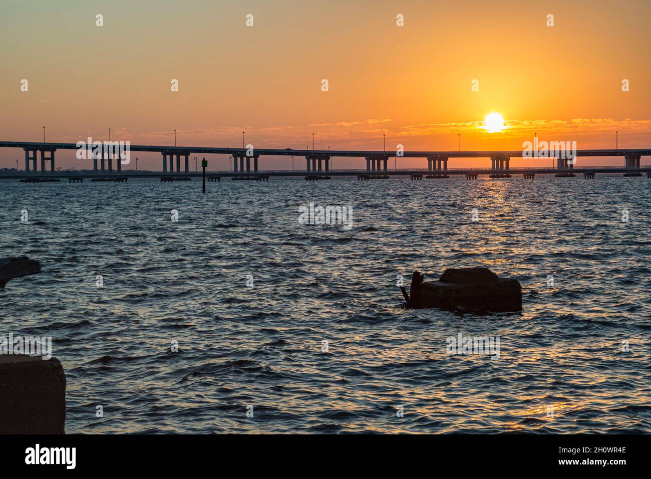 Biloxi Bay Bridge behind the remains of an old gantry crane track on ...
