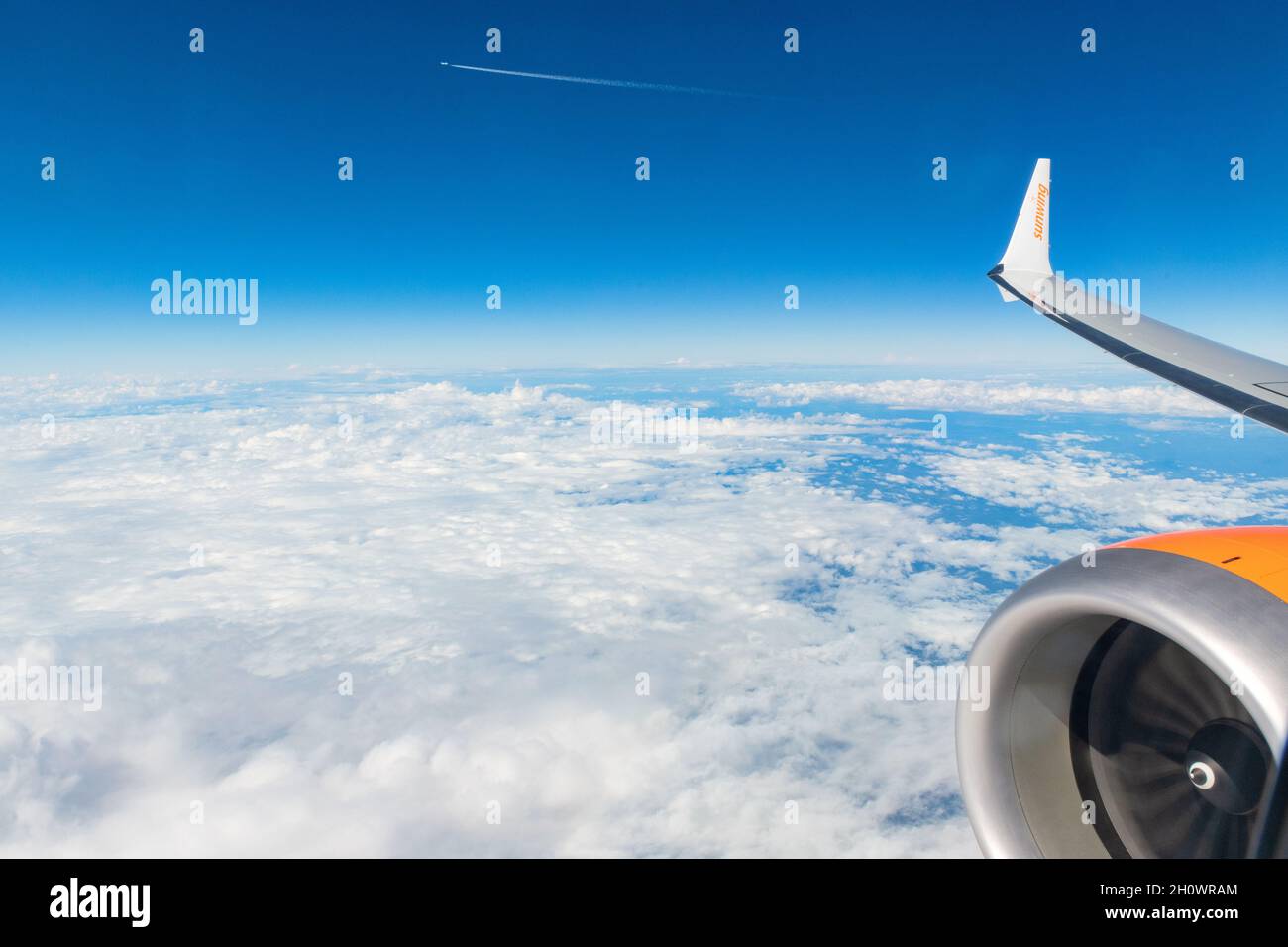 The engine and wing of a Boeing Max 8 of Sunwing in mid-air in Toronto ...