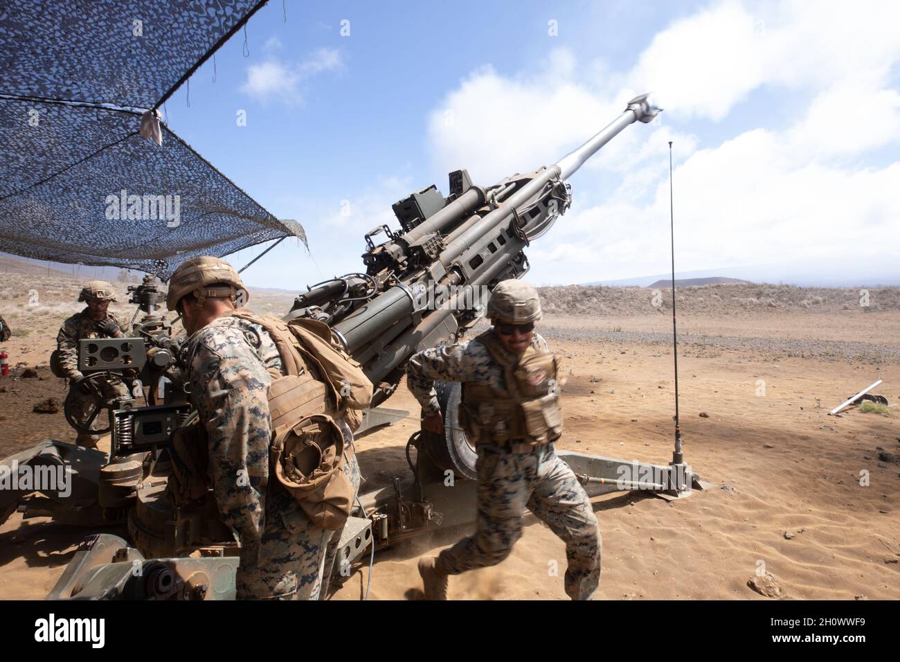 U.S. Marines with 1st Battalion, 12th Marines fire an M777 towed 155 mm ...