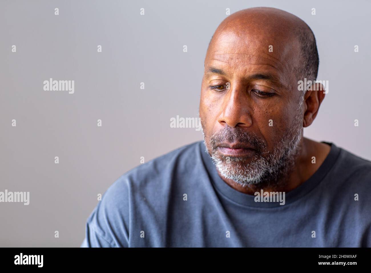 Mature man looking sad hi-res stock photography and images - Alamy