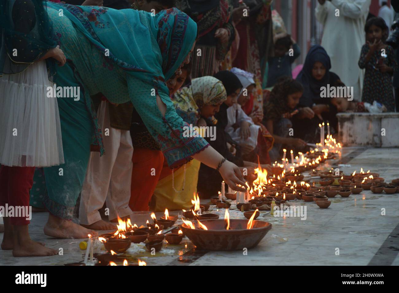 Pakistani Muslim devotees take part in the 398th birth anniversary Urs ...