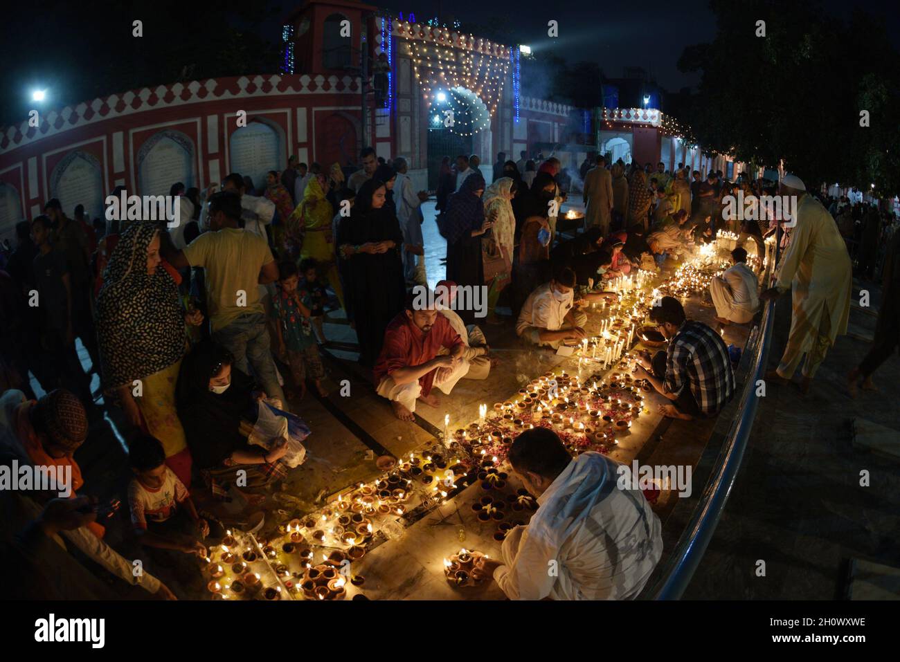 Pakistani Muslim devotees take part in the 398th birth anniversary Urs ...