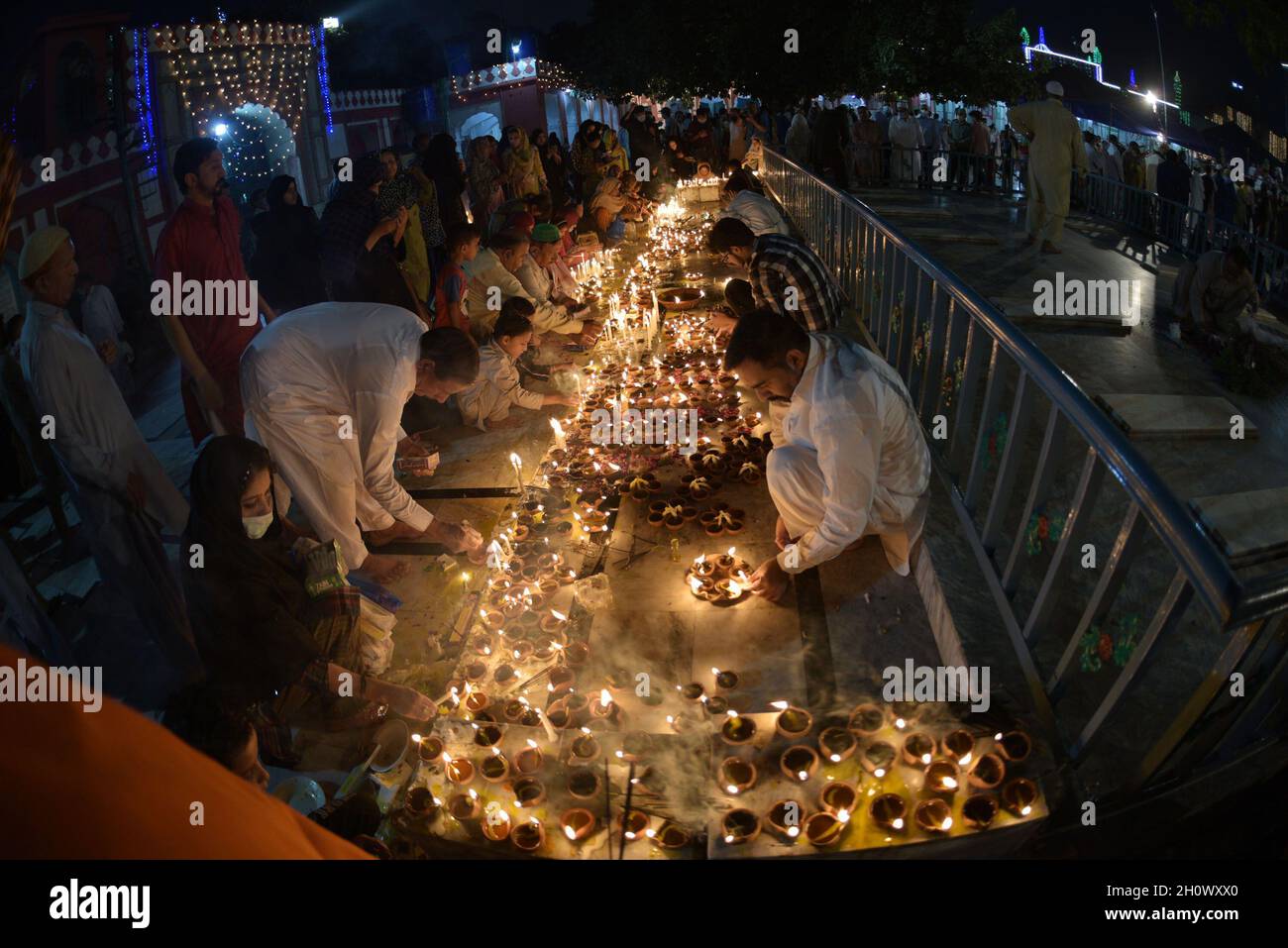 Pakistani Muslim devotees take part in the 398th birth anniversary Urs ...
