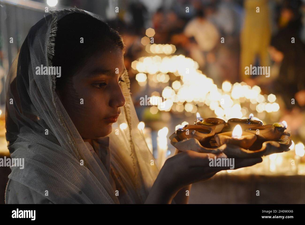 Pakistani Muslim devotees take part in the 398th birth anniversary Urs ...