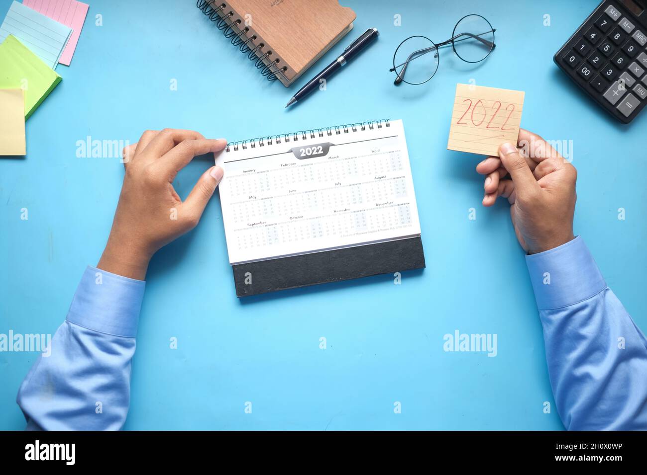 deadline concept with hand marking date on calendar top view Stock ...