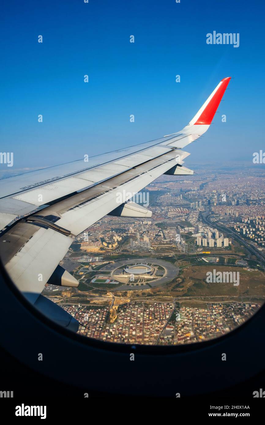 Looking through window aircraft during flight in wing lands over ...