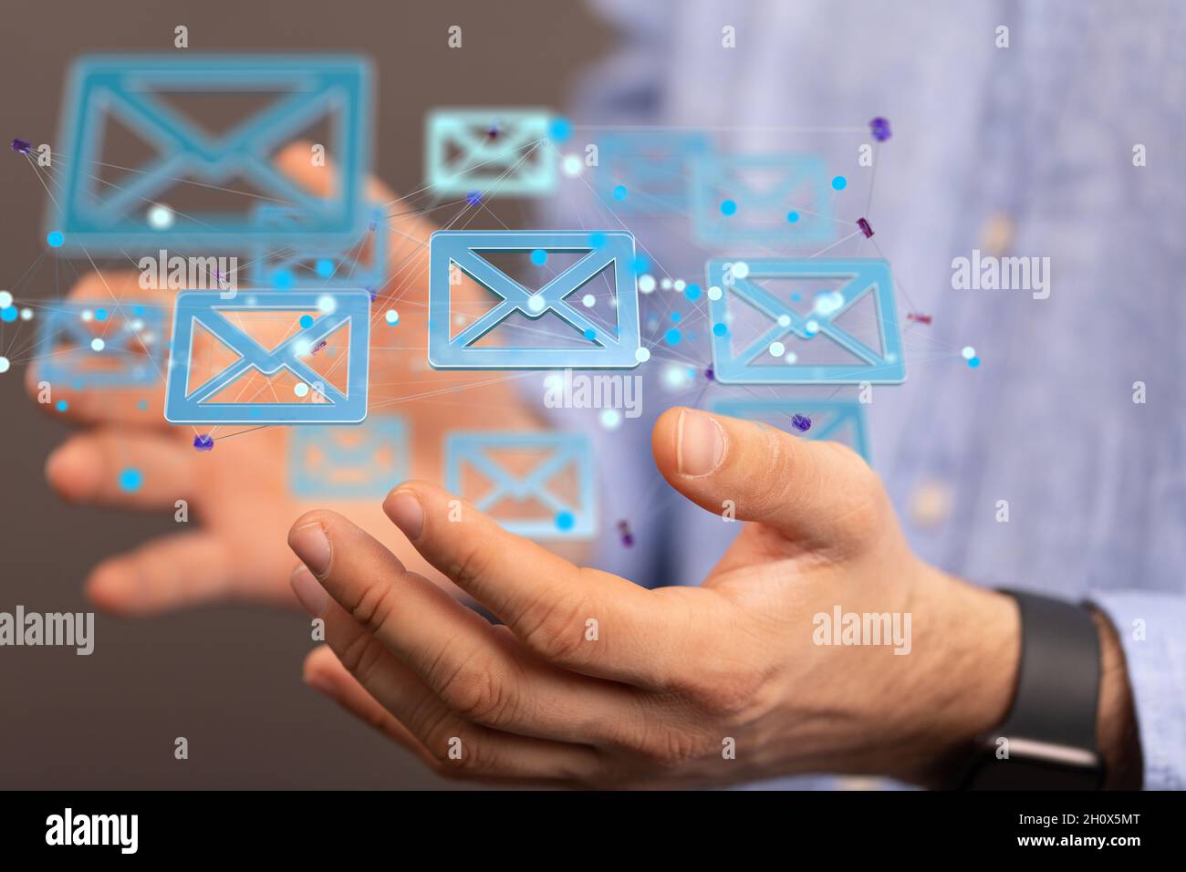 Person presenting the virtual projection of electronic mail icons Stock ...
