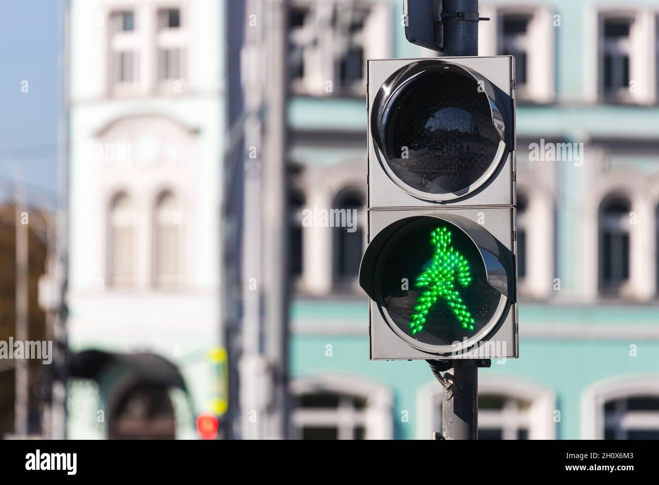 Traffic lights over urban intersection. Green light Stock Photo - Alamy