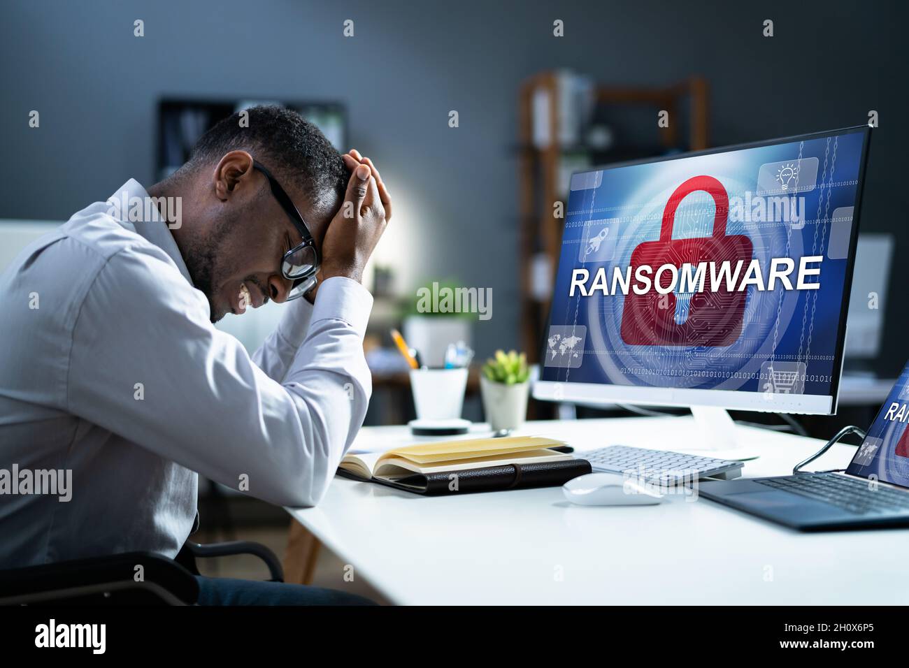Ransomware Malware Cyber Attack On Business Computer Stock Photo - Alamy