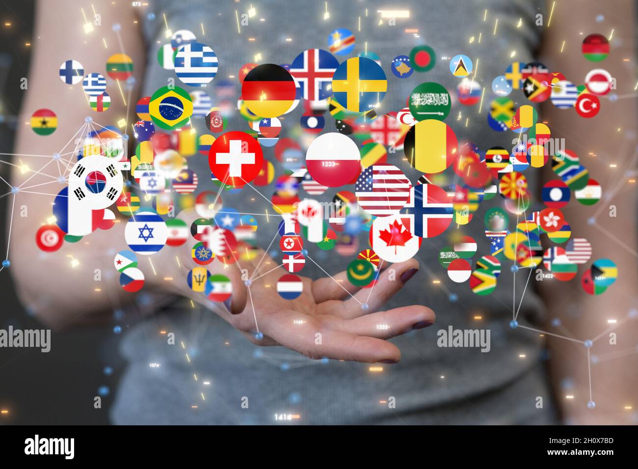 Person presenting the virtual projection of international country flags ...