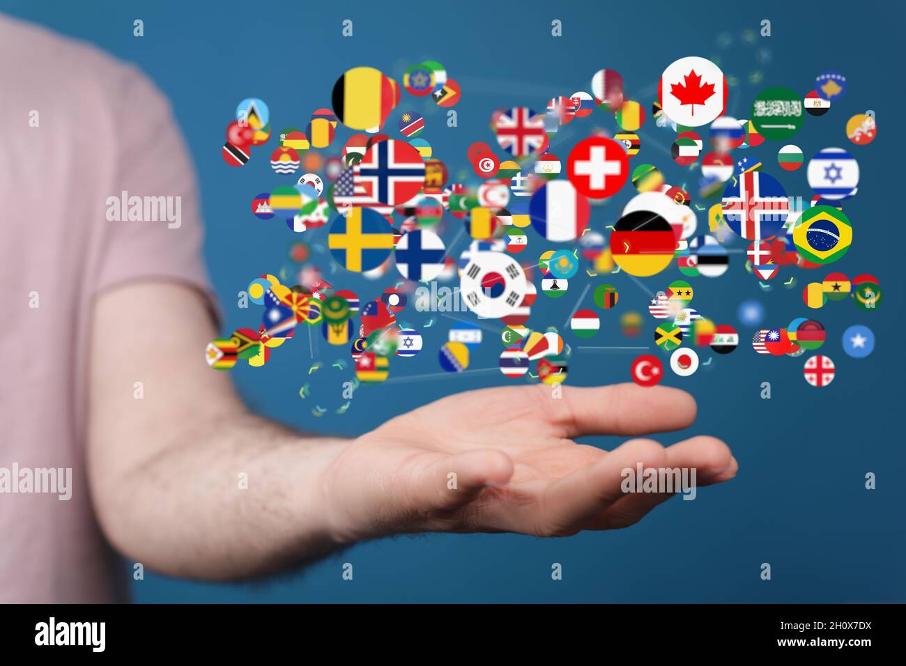 Person presenting the virtual projection of international country flags ...