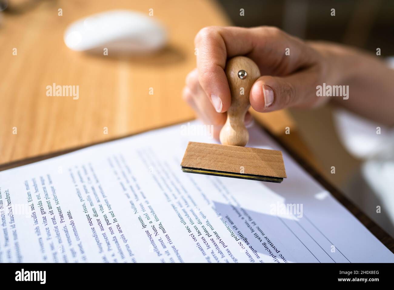 Notary Rubber Stamp In Hand. Official Paper Approved Stock Photo - Alamy