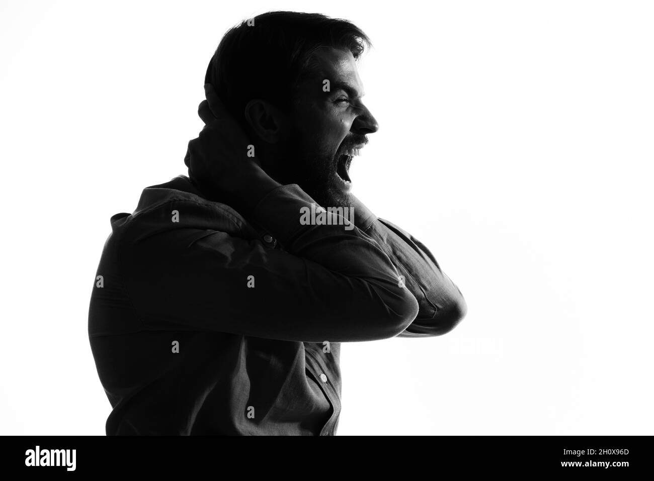 businessmen with a pistol in hand crime hand gesture light background ...