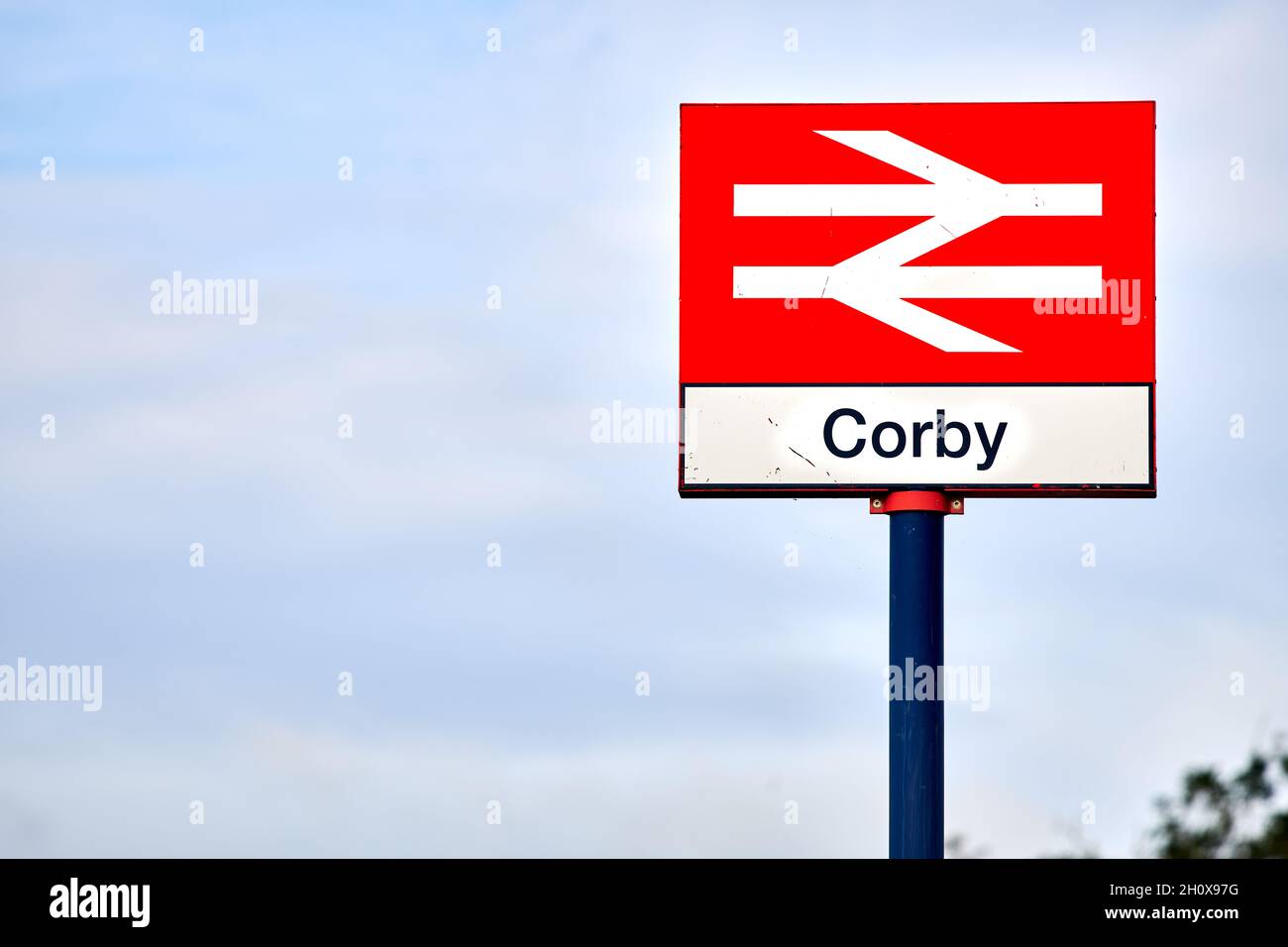 Sign for the rail station at Corby, England Stock Photo - Alamy