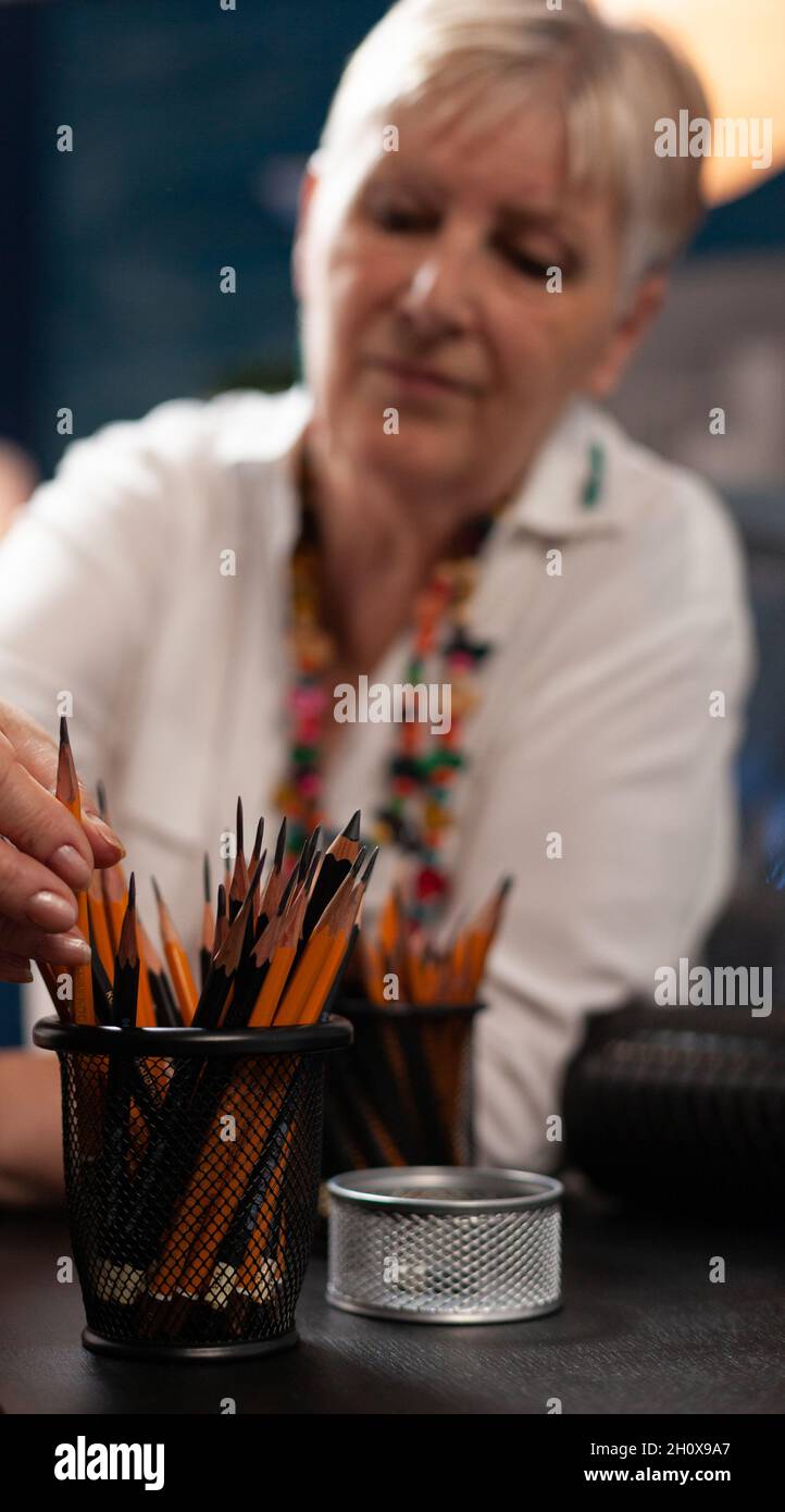 Woman drawing colorful portrait using hi-res stock photography and ...