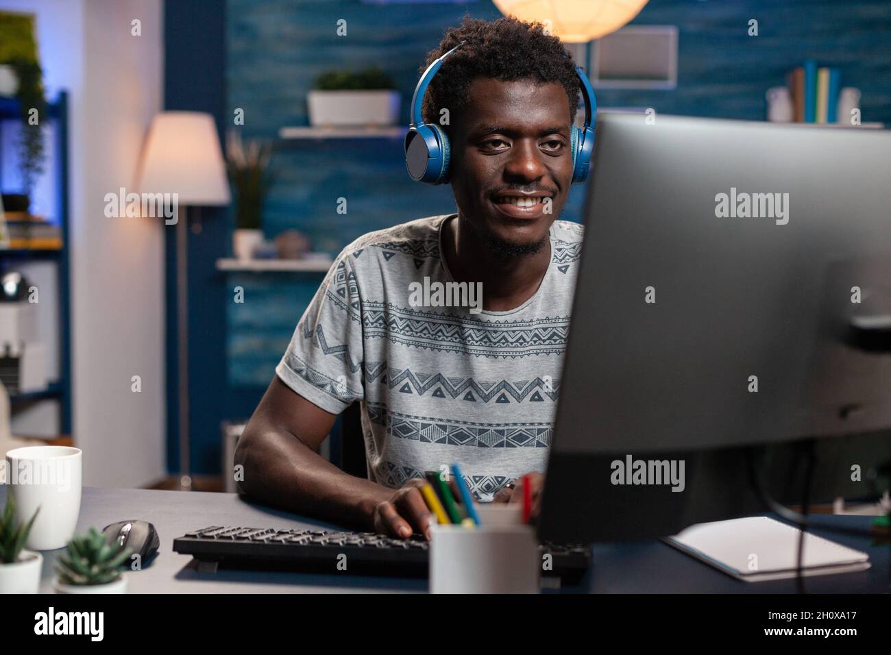 African american employee using computer for remote work typing ...