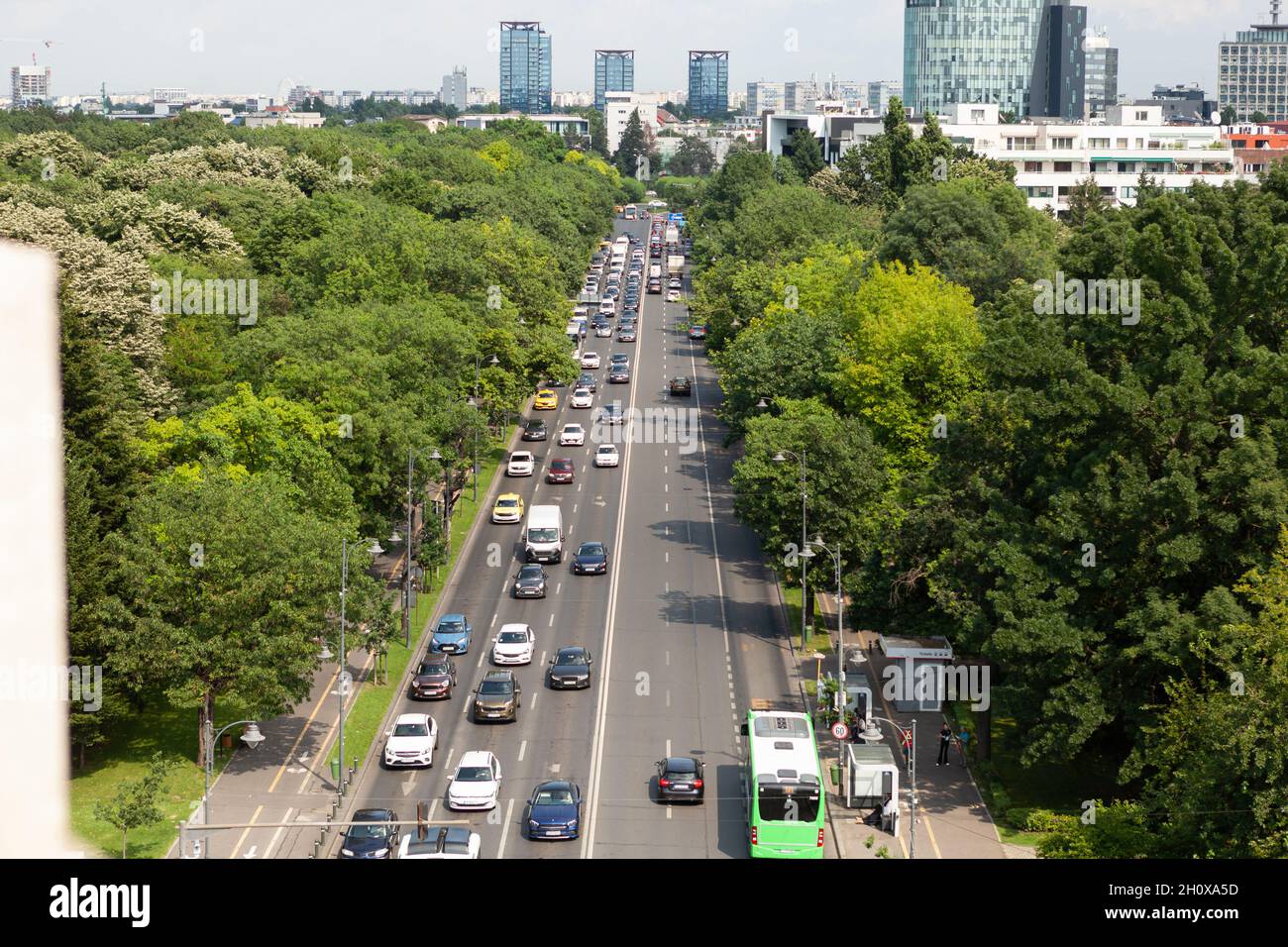 Panoramic view of boulevard with cars of metropolitan city during ...