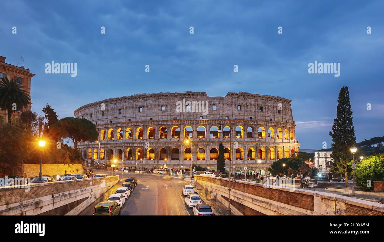Rome, Italy. Colosseum. Traffic Near Flavian Amphitheatre During Sunset ...