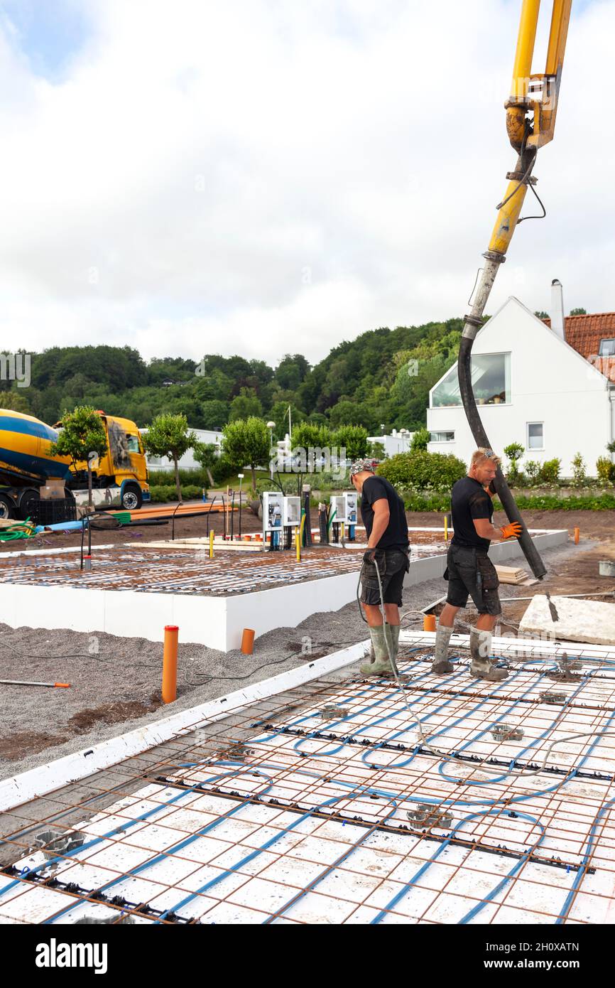Workers preparing foundations Stock Photo - Alamy