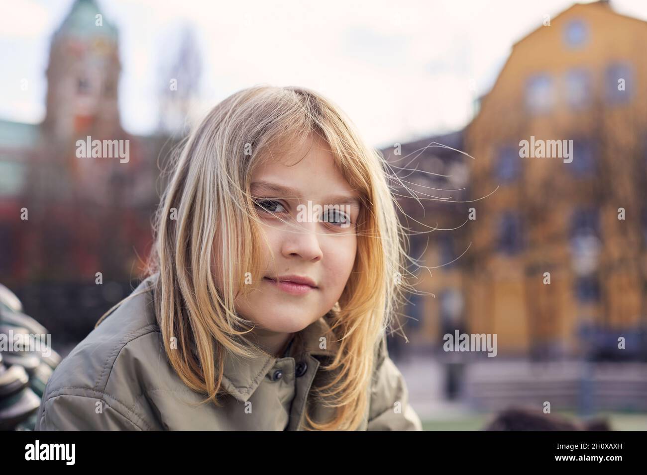 Portrait of girl looking at camera Stock Photo - Alamy