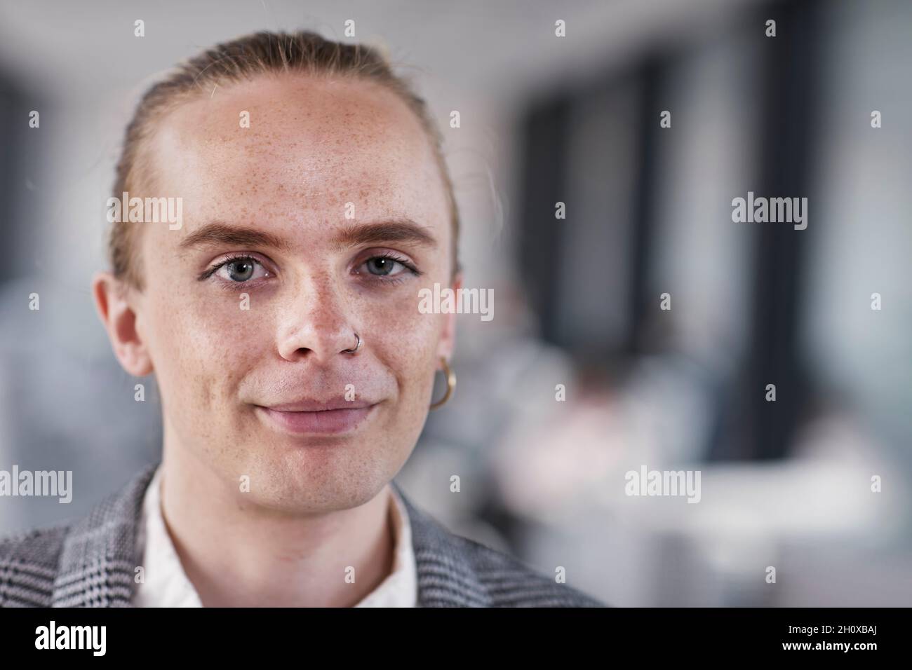 Non binary man smiling hi-res stock photography and images - Alamy