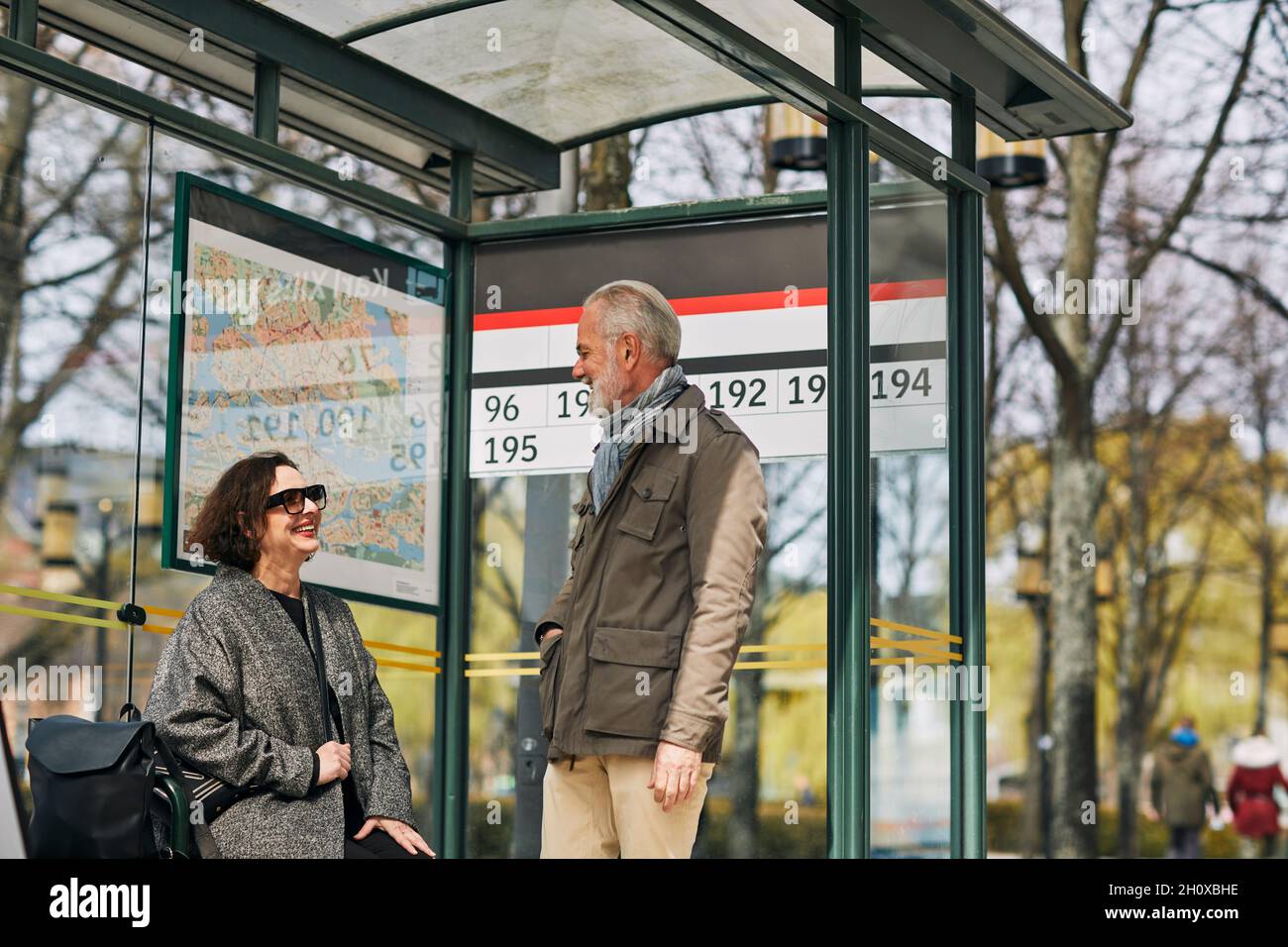 Mature couple talking bus hi-res stock photography and images - Alamy