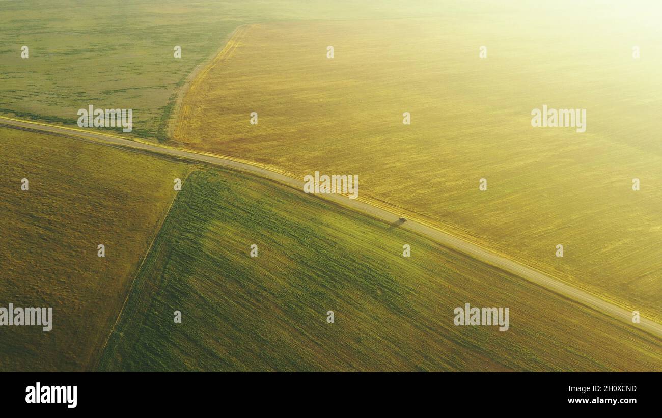 Aerial View Of Highway Road Through Field And Summer Green Meadow ...