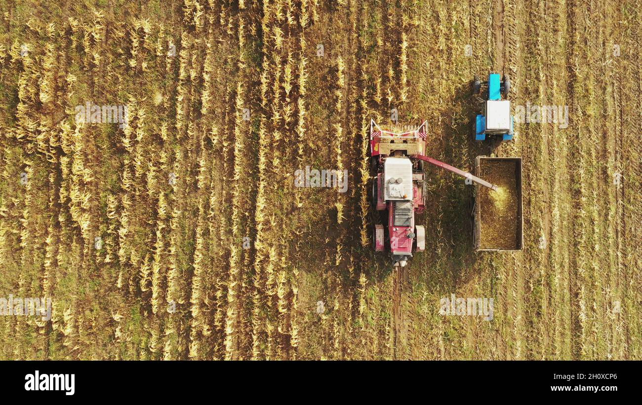 Aerial View Of Rural Landscape. Combine Harvester And Tractor Working ...