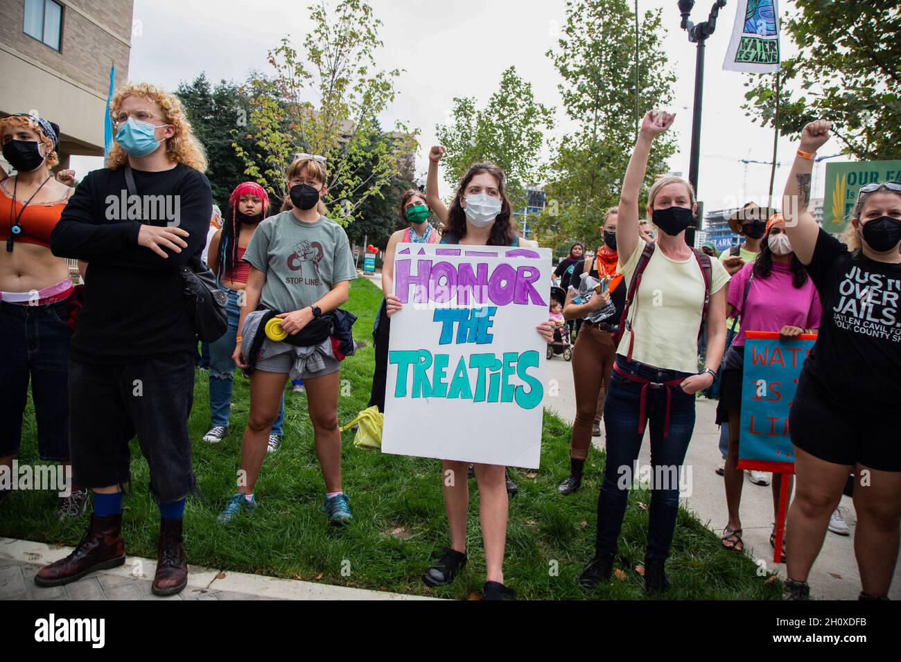A protester holds a placard expressing her opinion during the ...