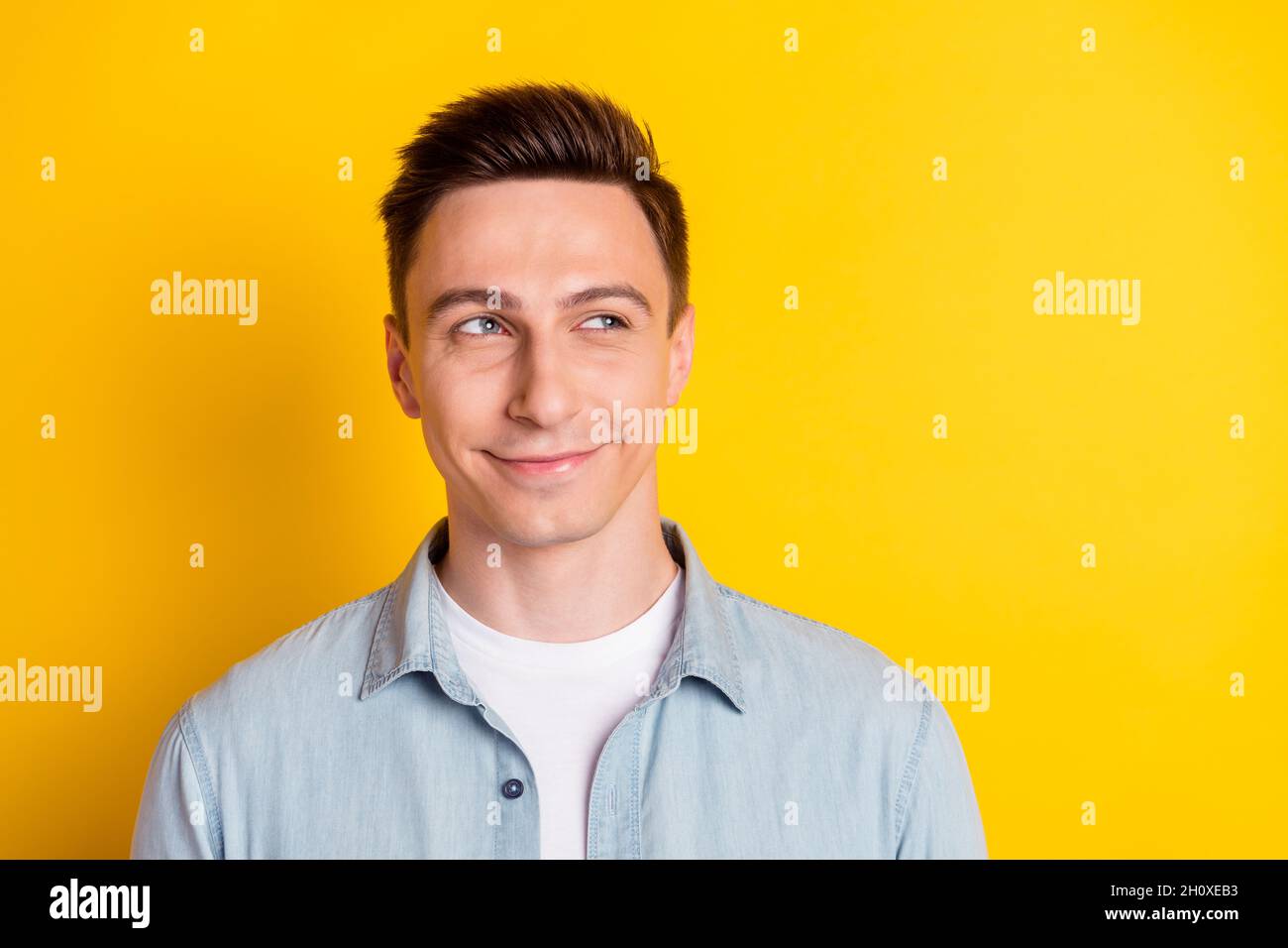 Portrait of young cheerful positive charismatic male look copyspace ...