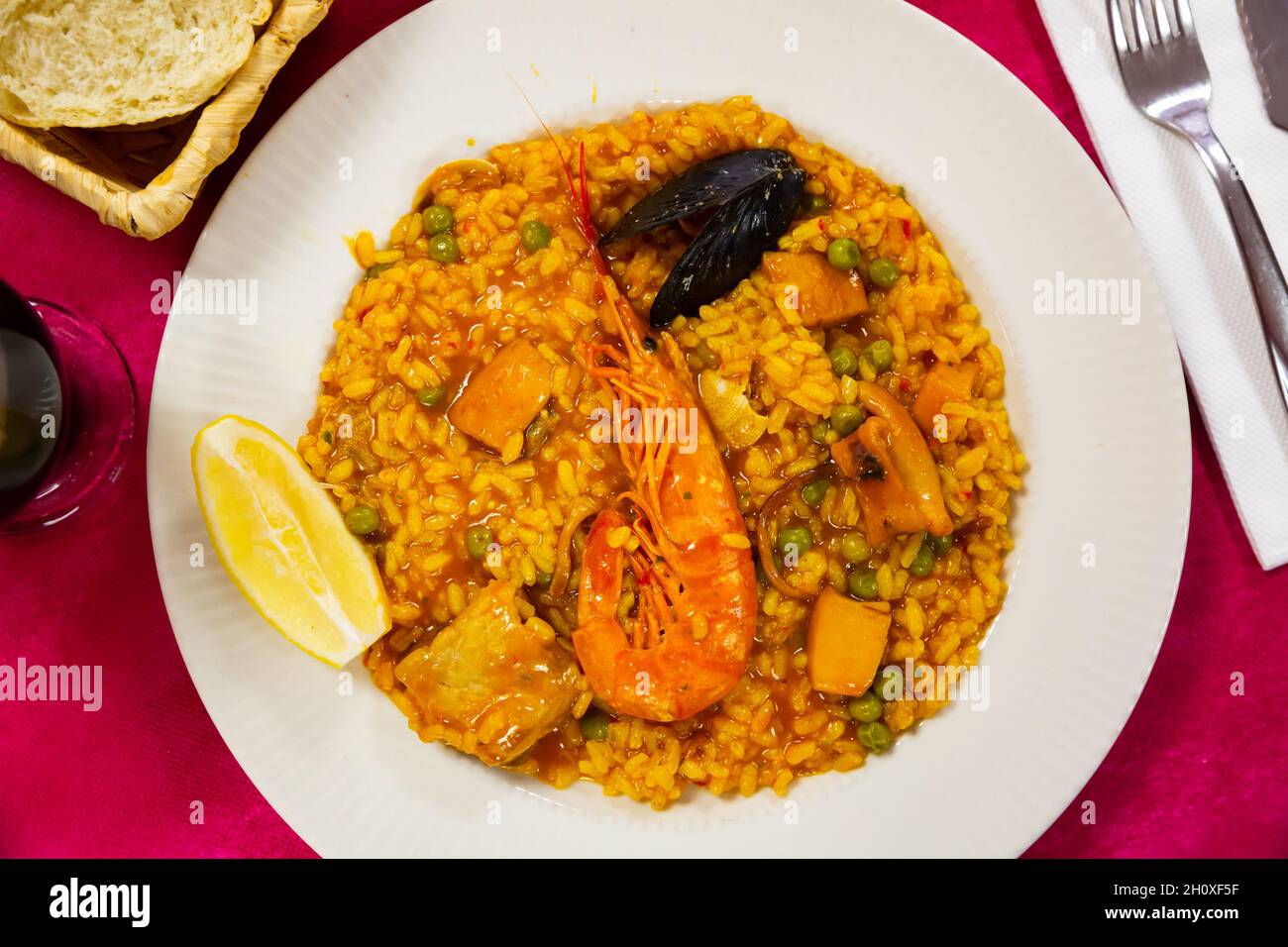 Spainsh dish seafood paella with rice, shrimps and mussels Stock Photo ...