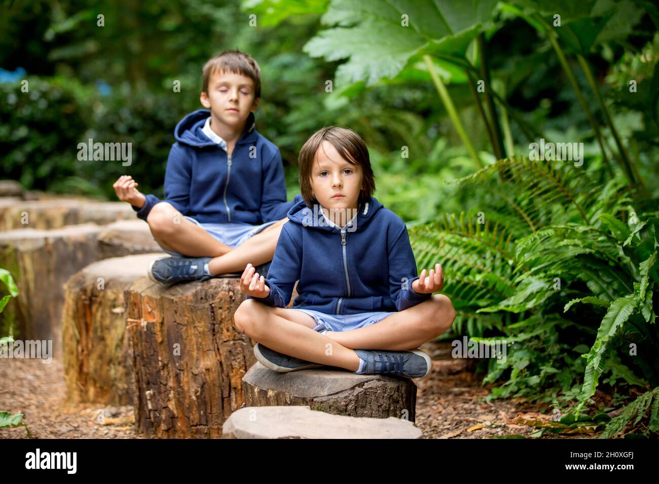 Boy trunks sitting hi-res stock photography and images - Alamy