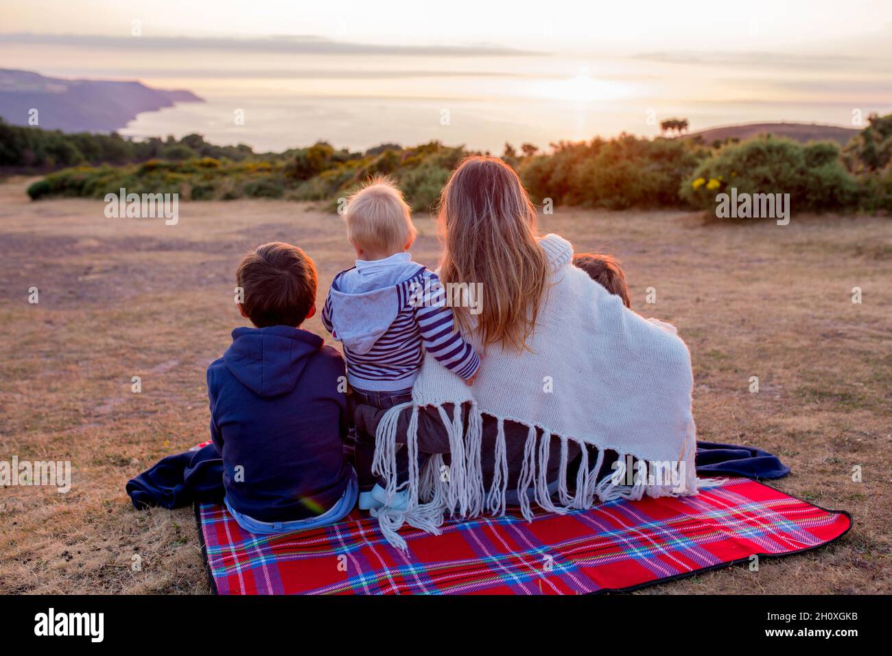 Woman watching over children hi-res stock photography and images - Alamy