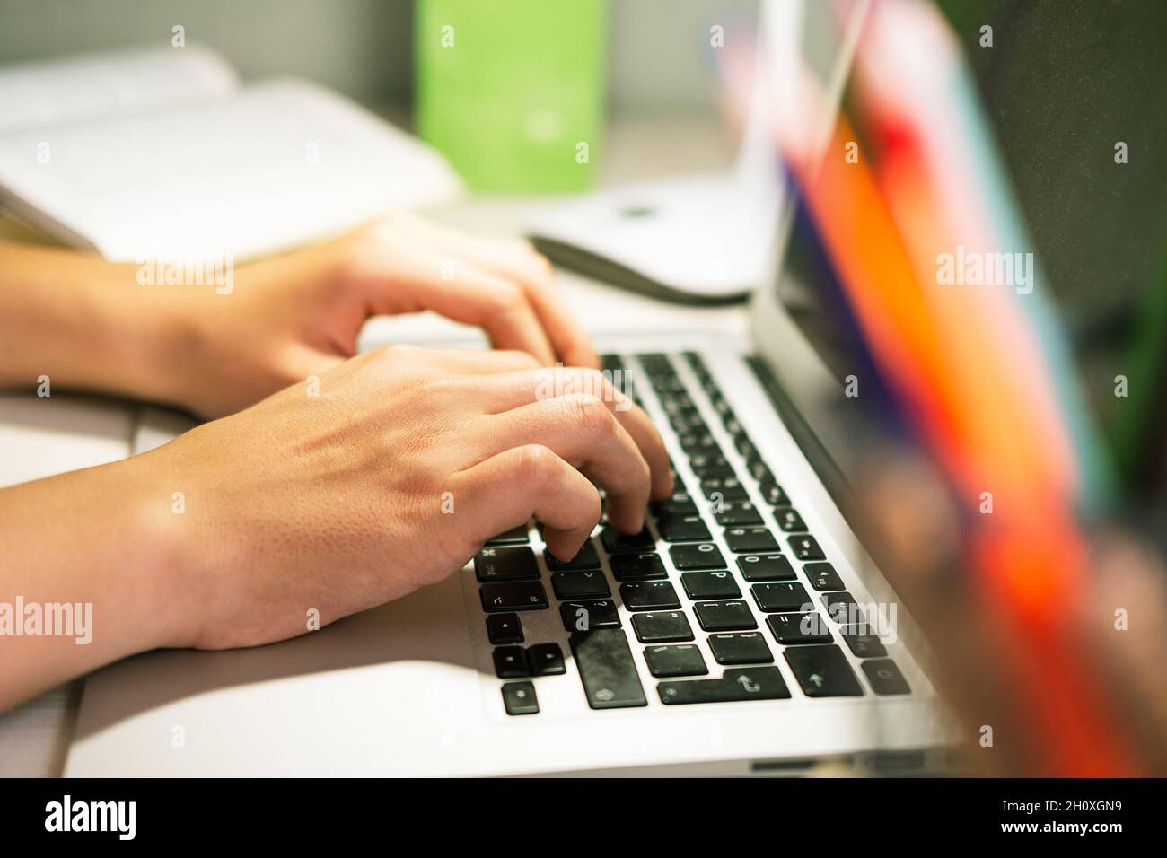 Teenage student typing on laptop hi-res stock photography and images ...