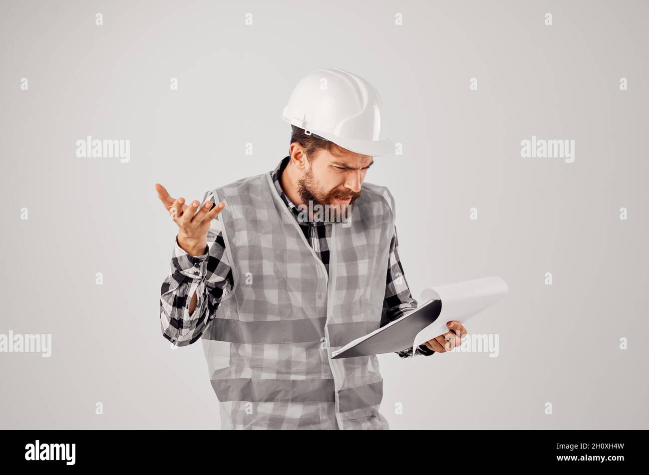engineer with documents and drawings blueprints studio industry Stock ...