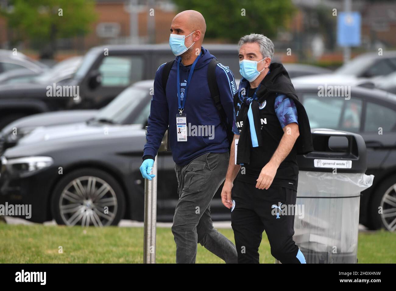 Manchester City manager Pep Guardiola and assistant Juanma Lillo arrive ...