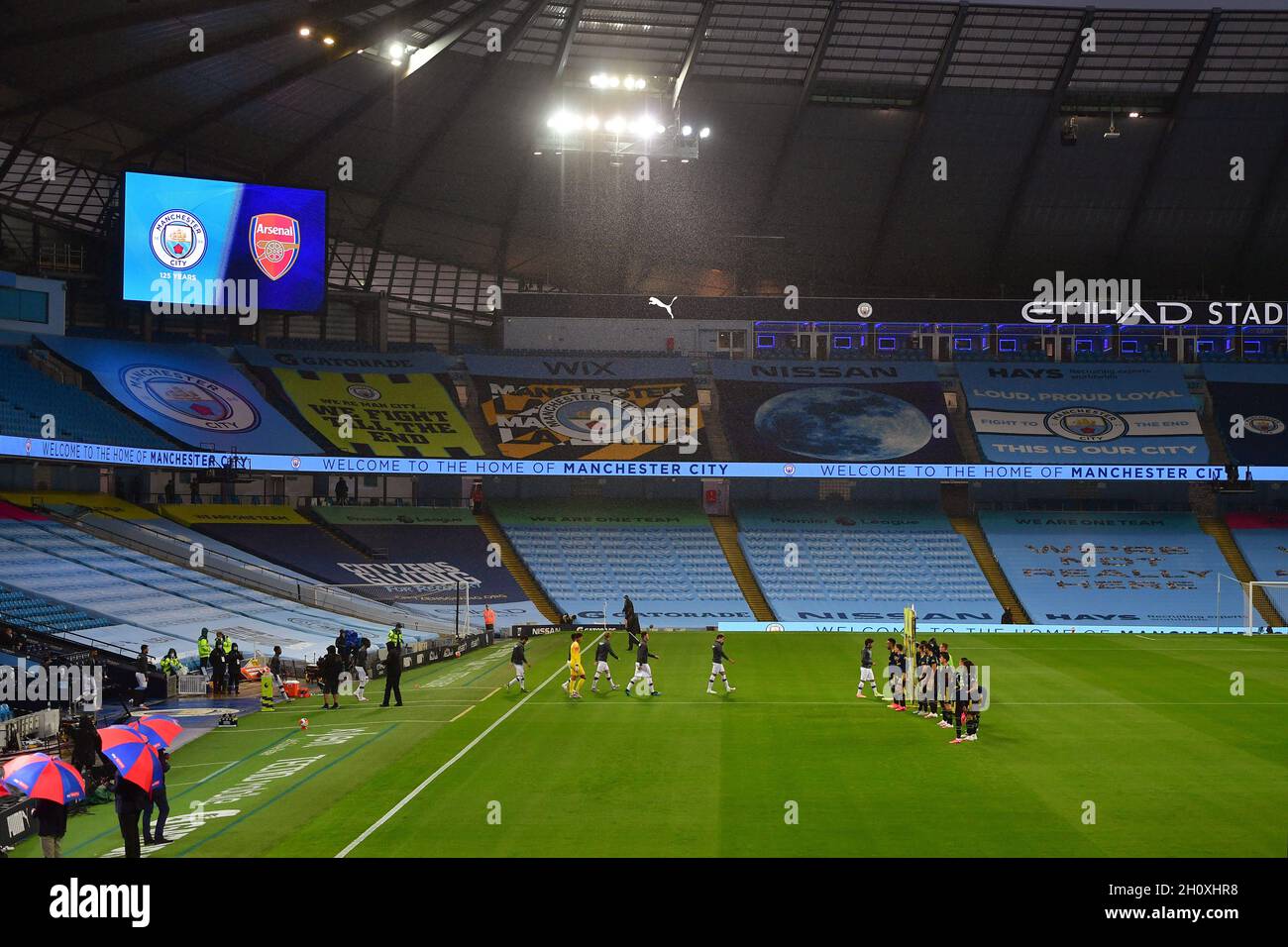 The teams take to the field prior to kick-off during the Premier League ...
