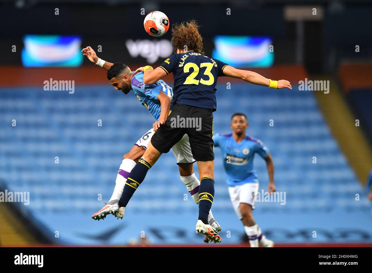 Manchester City's Riyad Mahrez and Arsenal’s David Luiz compete for a ...